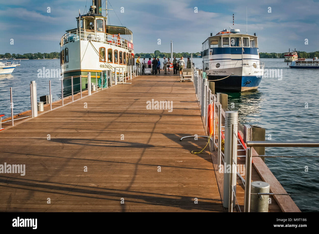 Waterfront, Lakeshore, Toronto- Tour boats docked to pier Stock Photo ...