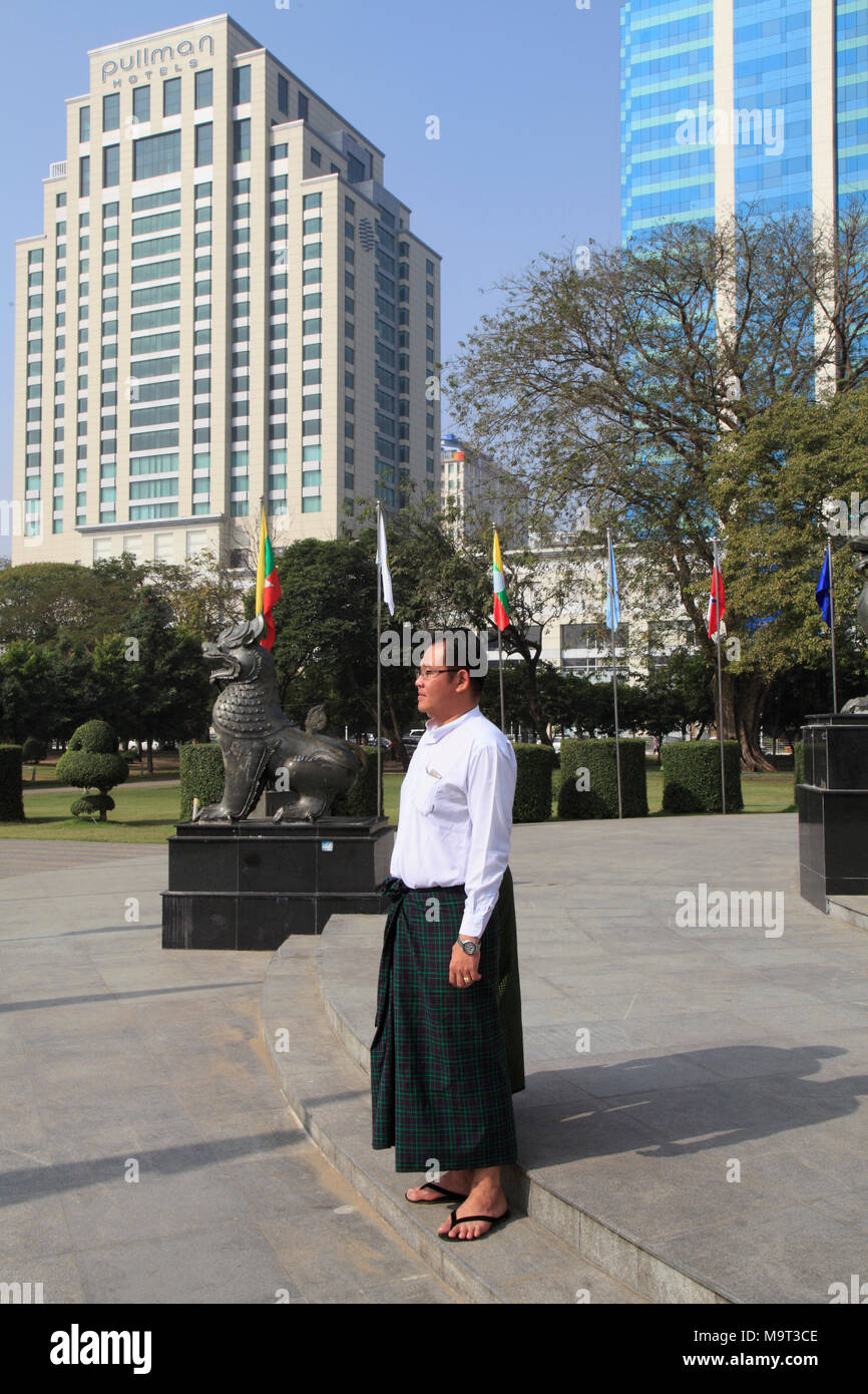 Myanmar, Yangon, Mahabandoola Garden, skyline, man in traditional ...