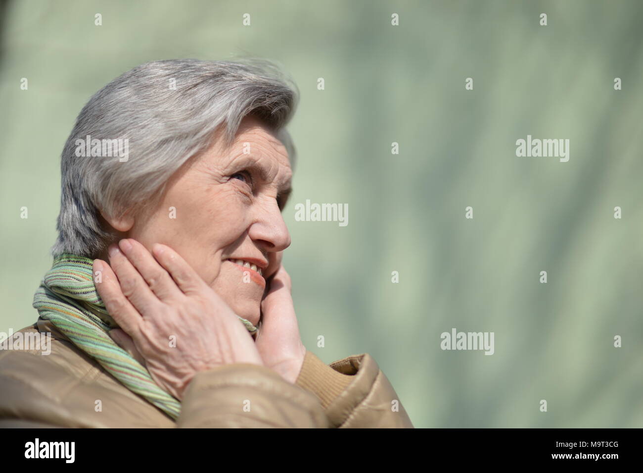old woman enjoying a walk on the nature of the spring Stock Photo - Alamy