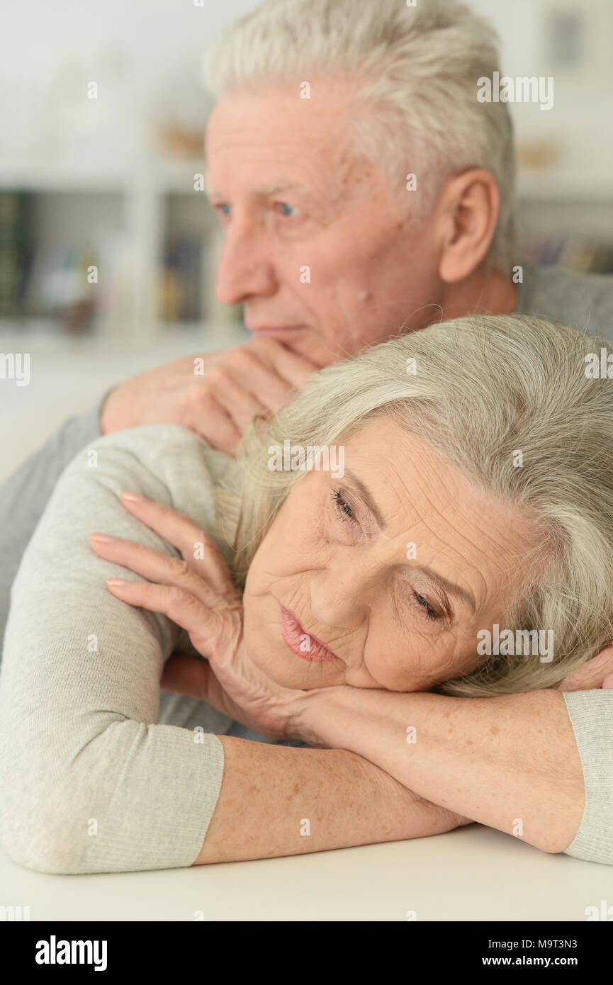 Portrait of a sad senior couple posing Stock Photo - Alamy