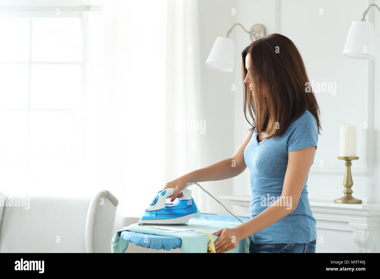 Household. Housemaid at daily work Stock Photo - Alamy