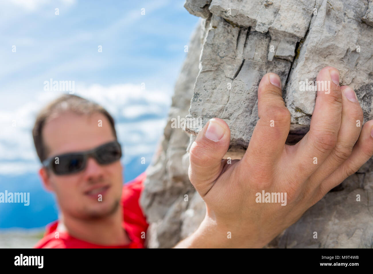 Closeup of climber's hand gripping a rock Stock Photo - Alamy