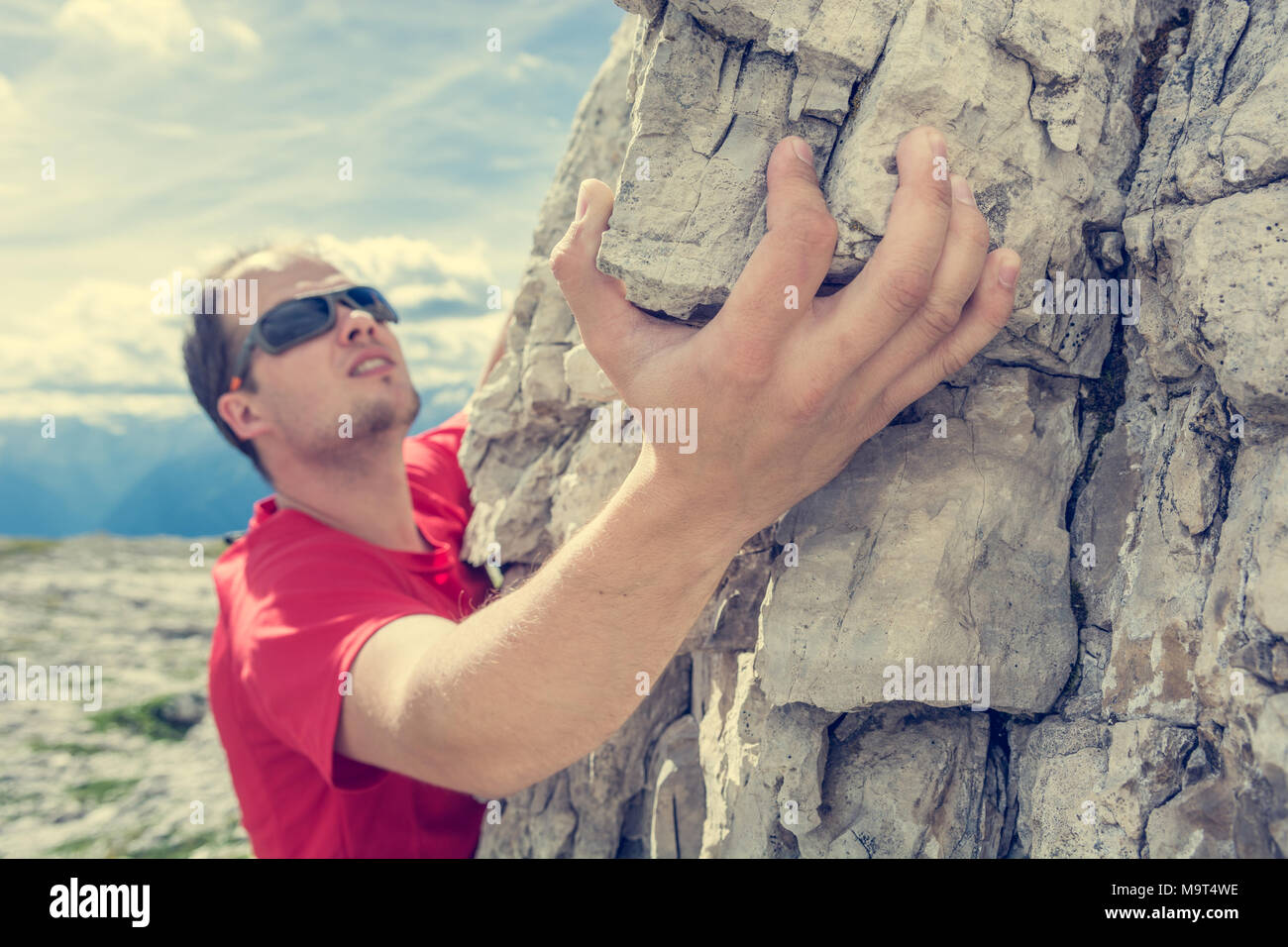 Closeup of climber's hand gripping a rock Stock Photo - Alamy