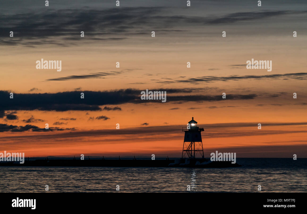 Sunrise over Lake Superior at the lighthouse in Grand Marais, Minnesota ...