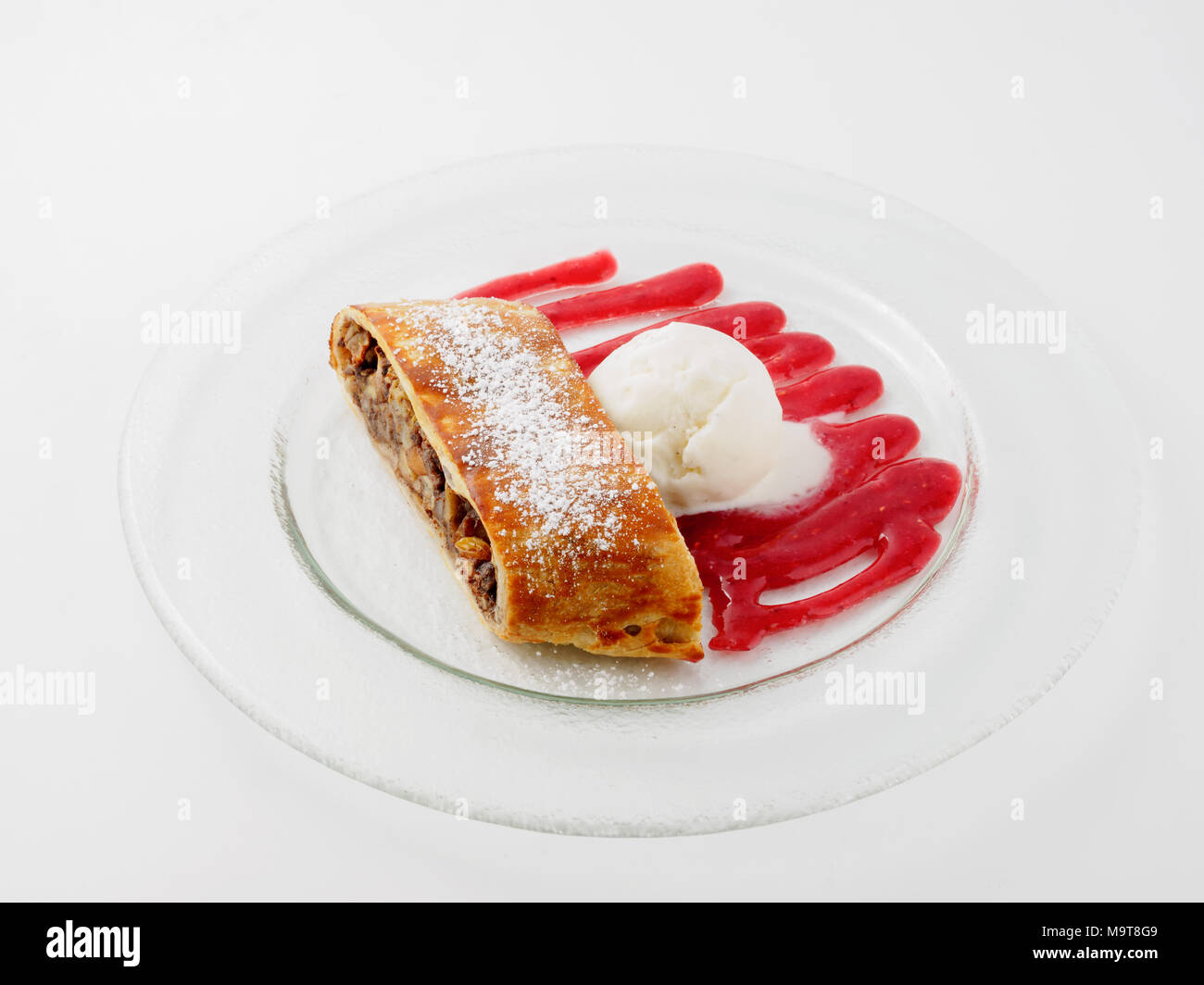 Restaurant dish. Apple strudel on the glass plate Stock Photo - Alamy