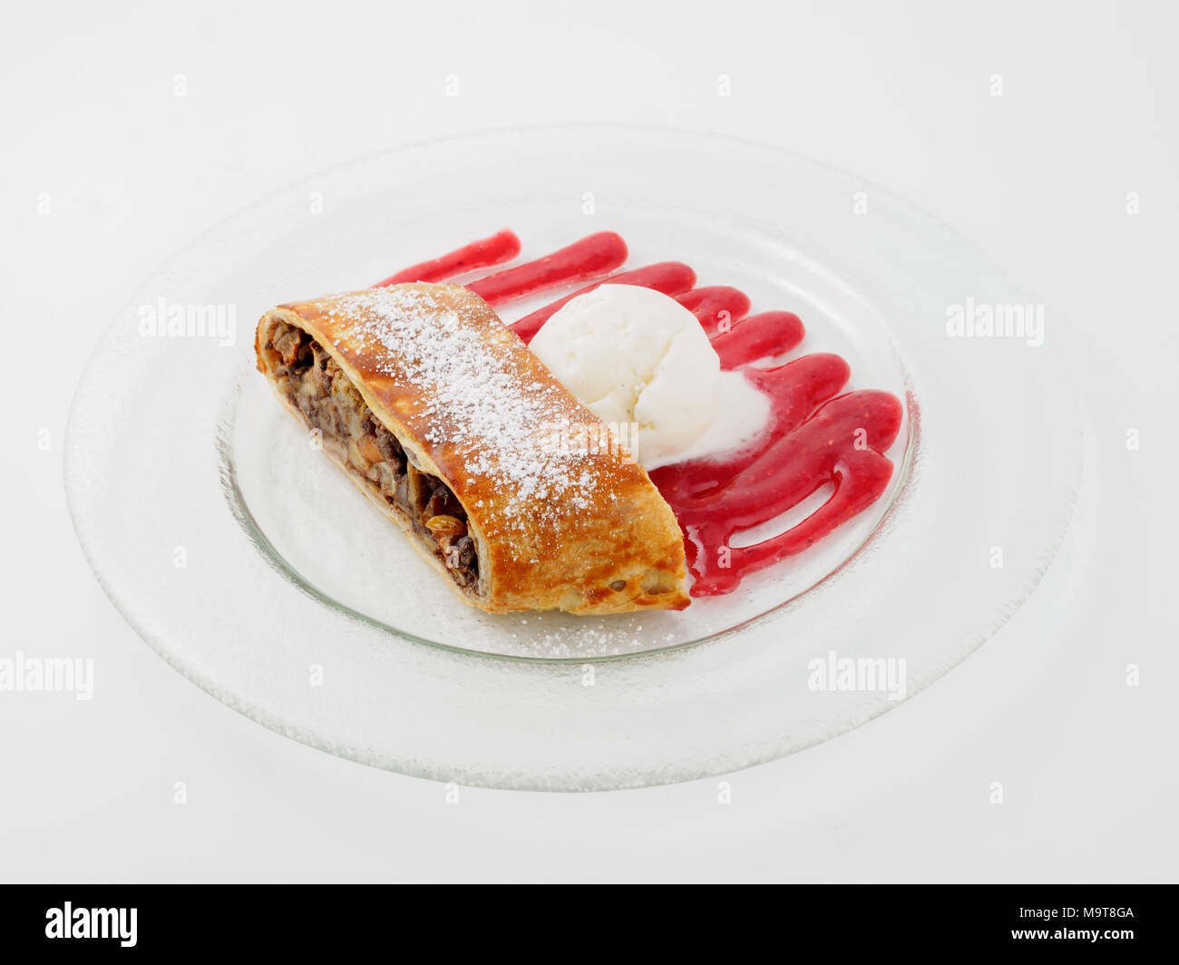 Restaurant dish. Apple strudel on the glass plate Stock Photo - Alamy
