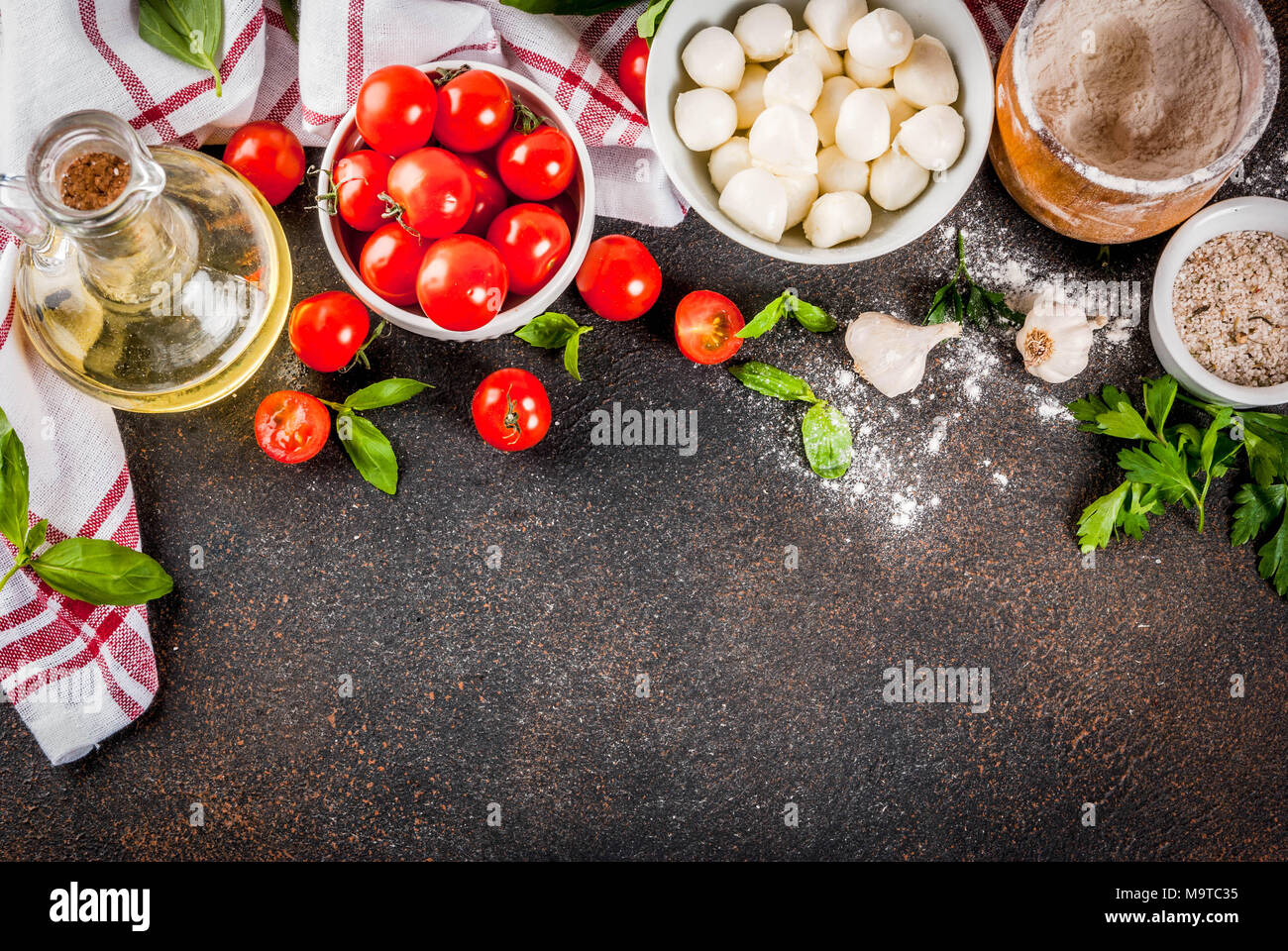 Homemade pasta pizza italian food ingredient on dark rusty table with ...