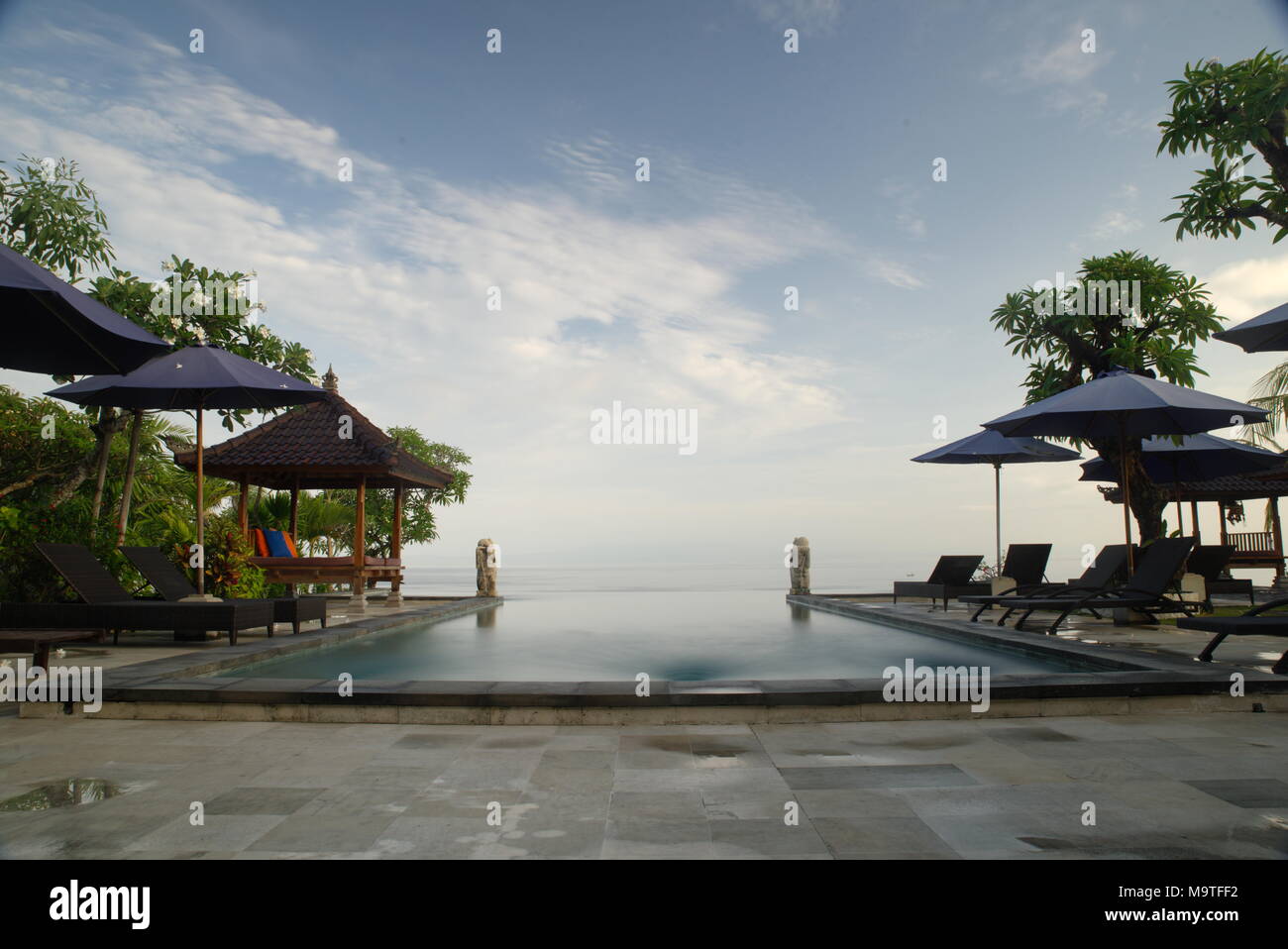 Infinity Pool at a Villa in Bali Stock Photo - Alamy