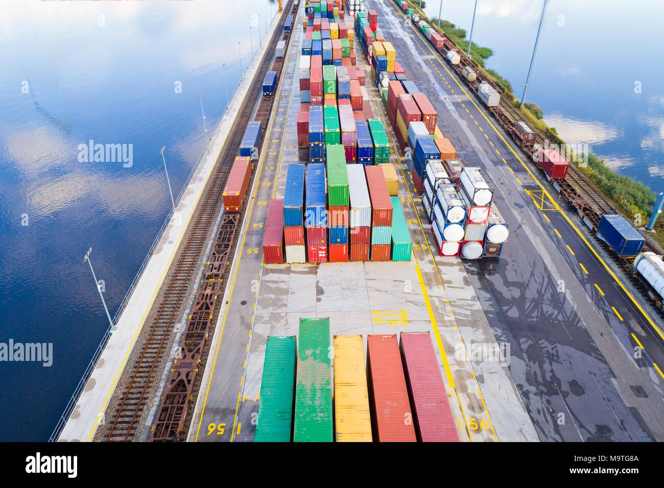 Cargo river harbour with shipping containers. Logistics centre Stock ...