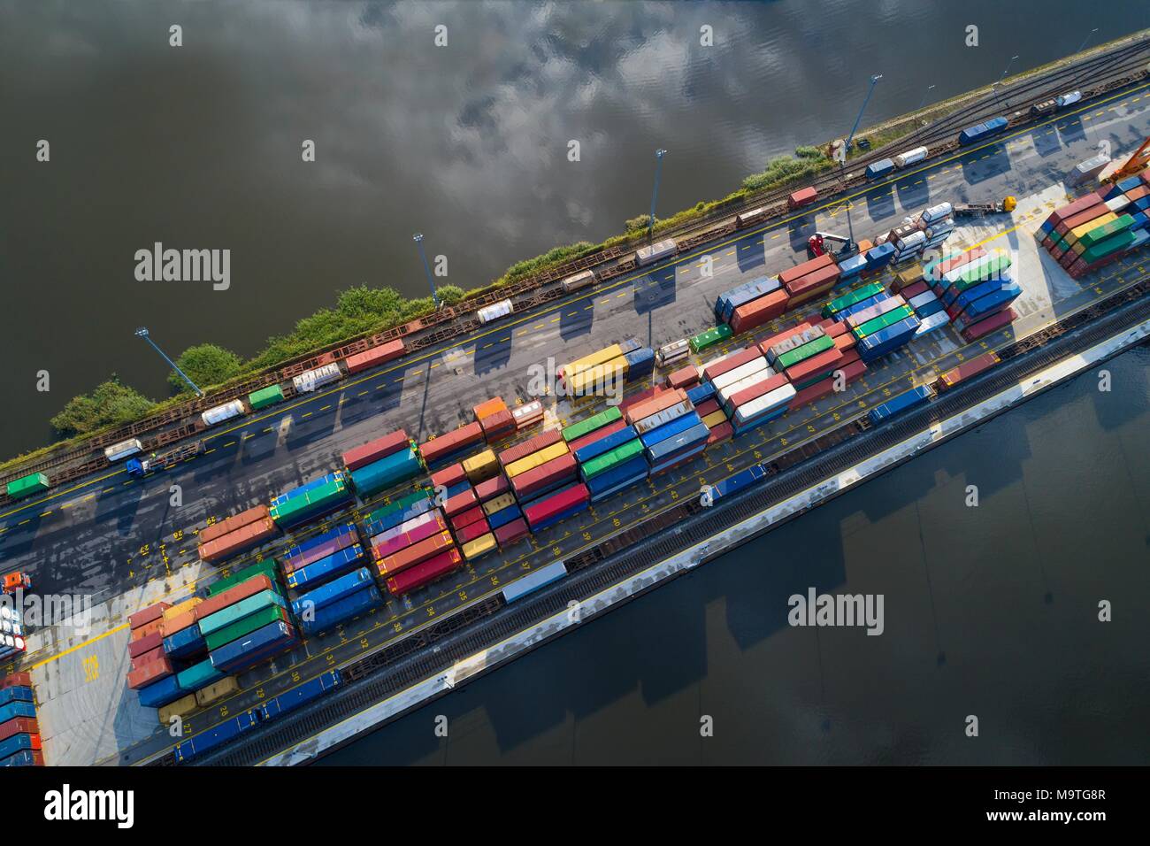 Cargo river harbour with shipping containers. Logistics centre Stock ...