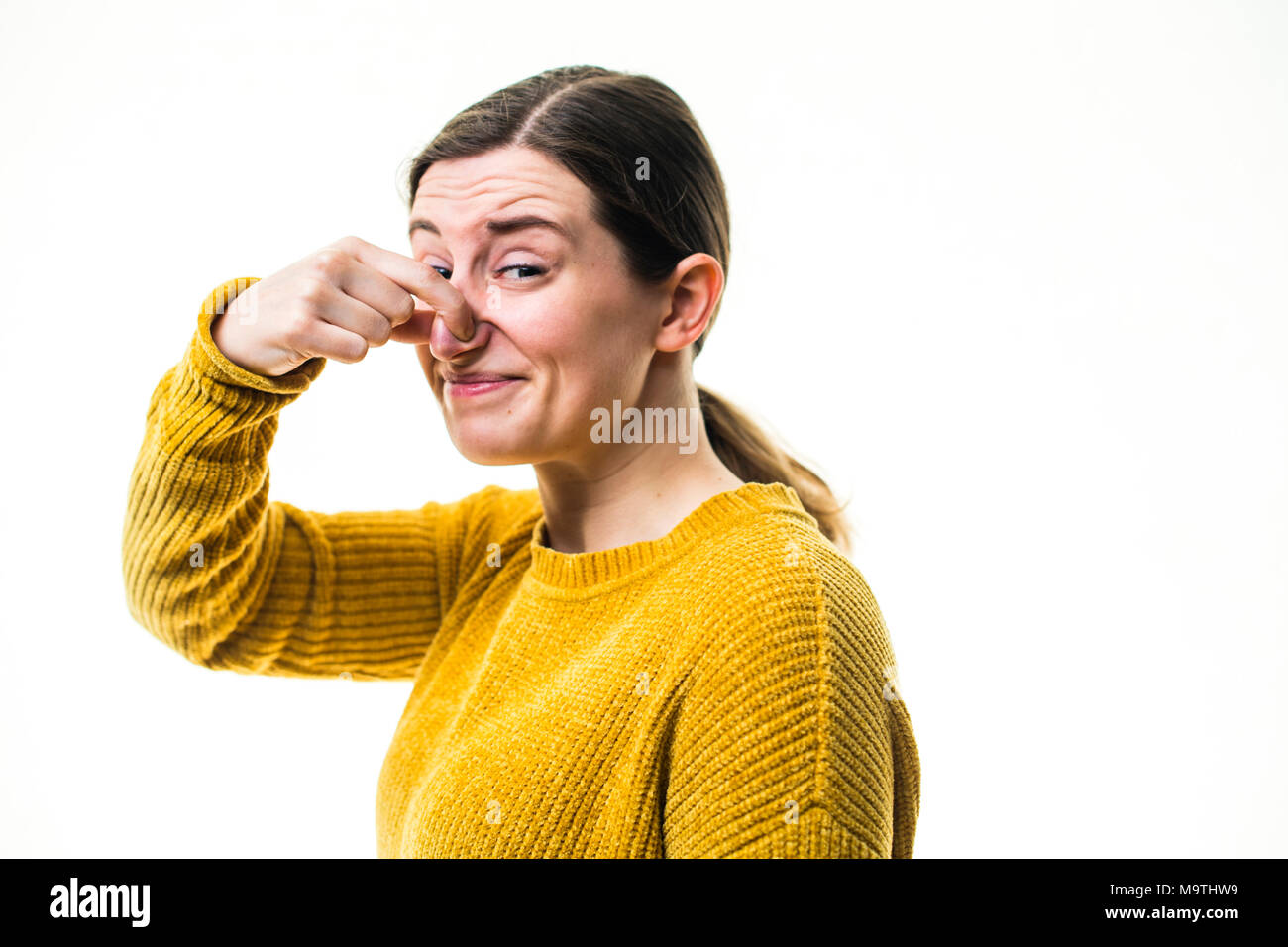 Person pinching nose smelly hi-res stock photography and images - Alamy