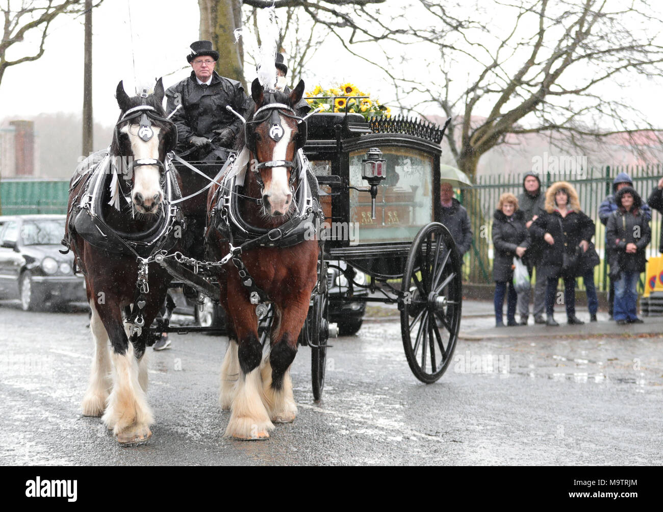 The funeral cortege carries Sir Ken Dodd's coffin from his home in ...