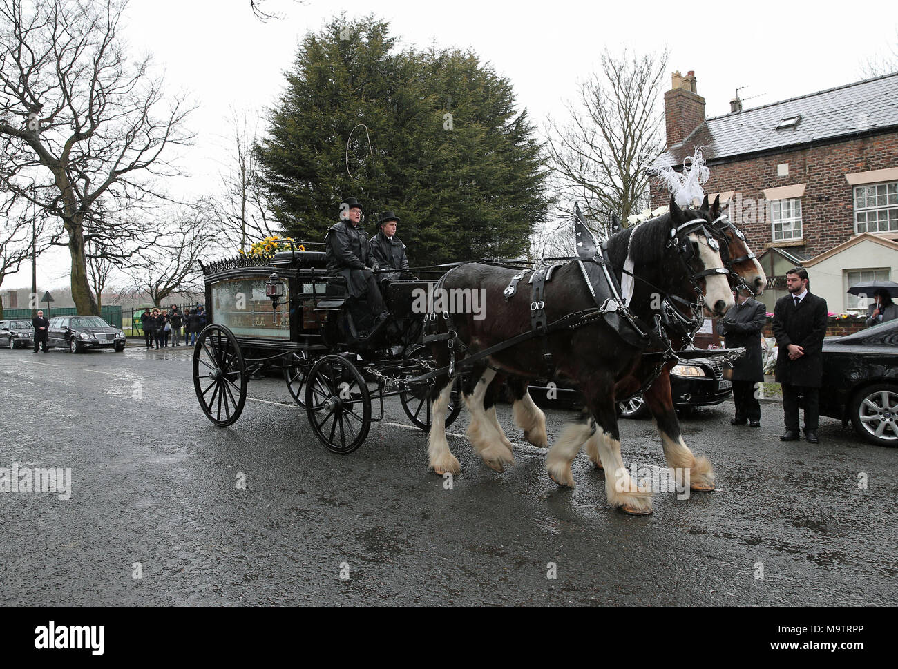 The funeral cortege carries Sir Ken Dodd's coffin from his home in ...