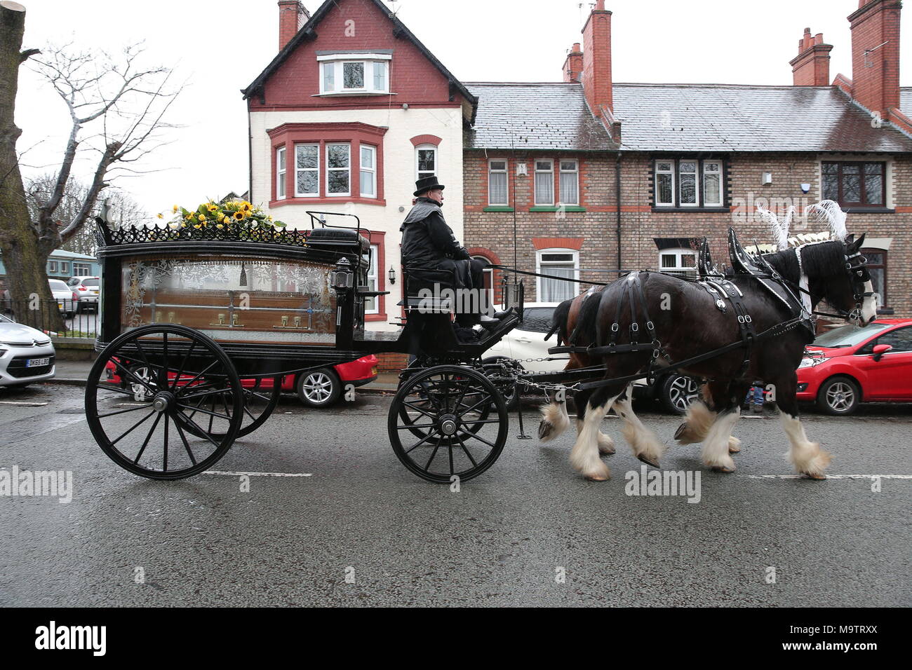 The funeral cortege carries Sir Ken Dodd's coffin from his home in ...