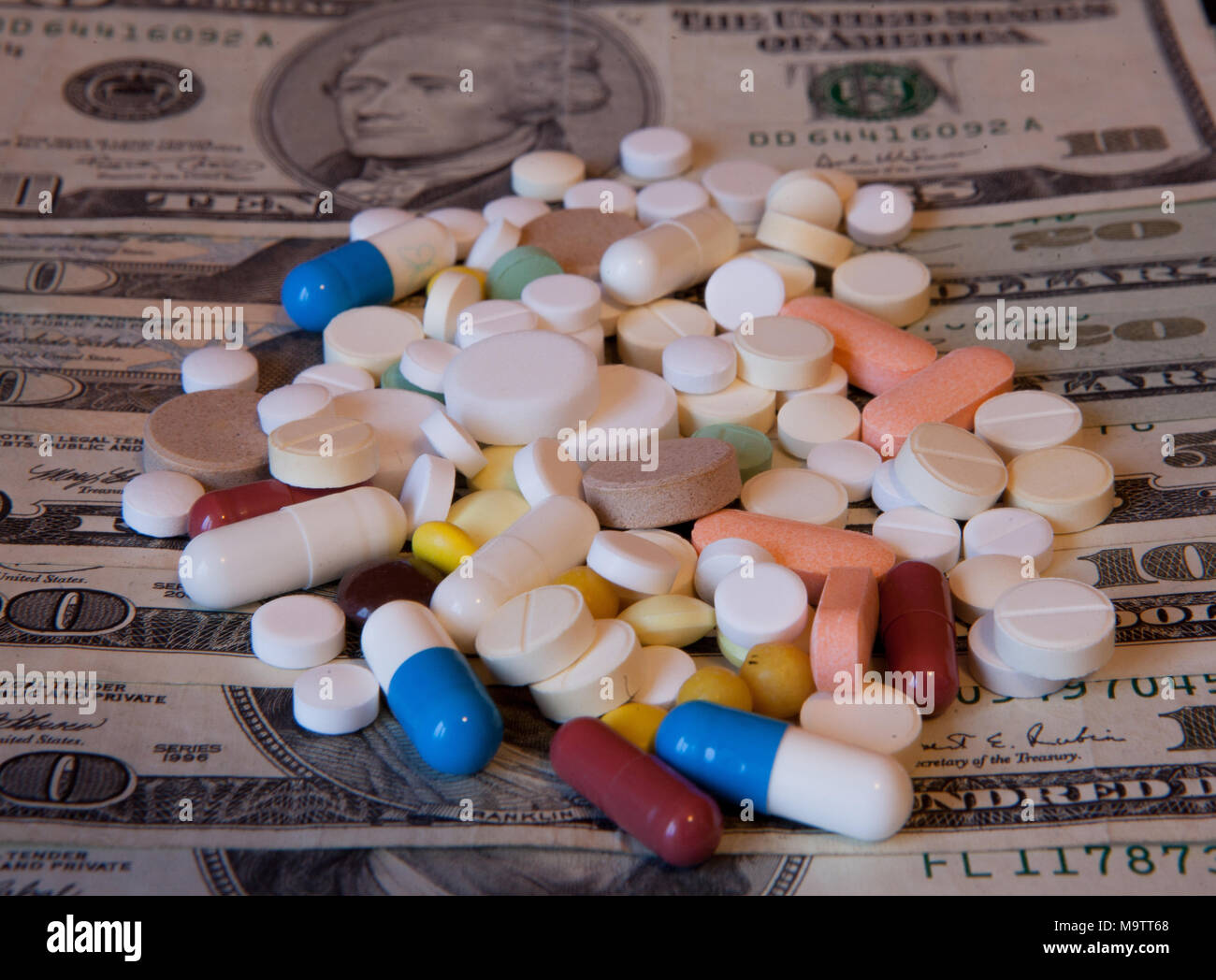 Medicine pills or capsules with money, dollar. Medical or pharmacy ...