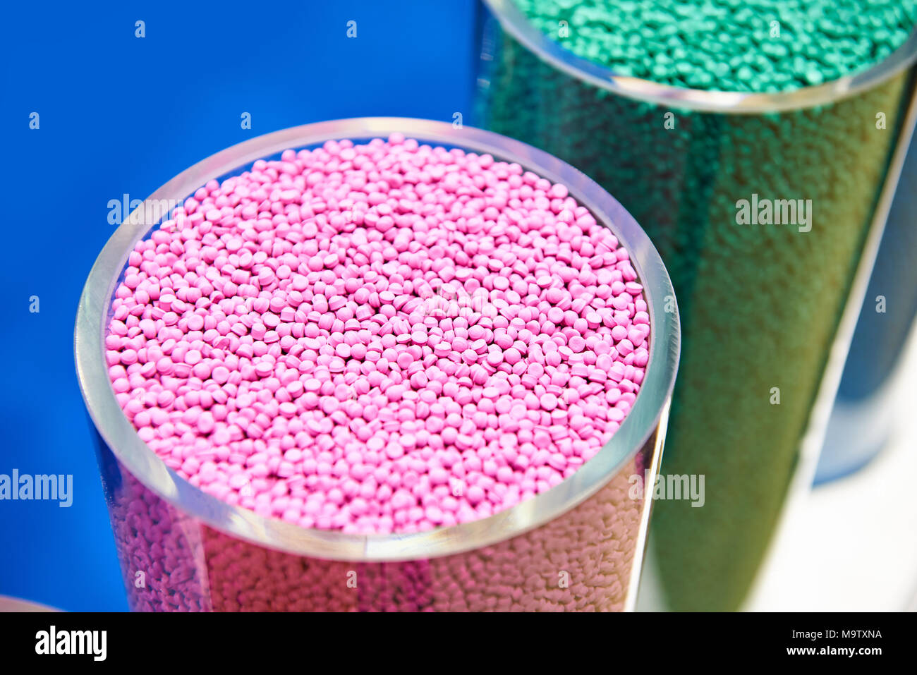 Plastic granular polymer. Samples in flasks Stock Photo - Alamy