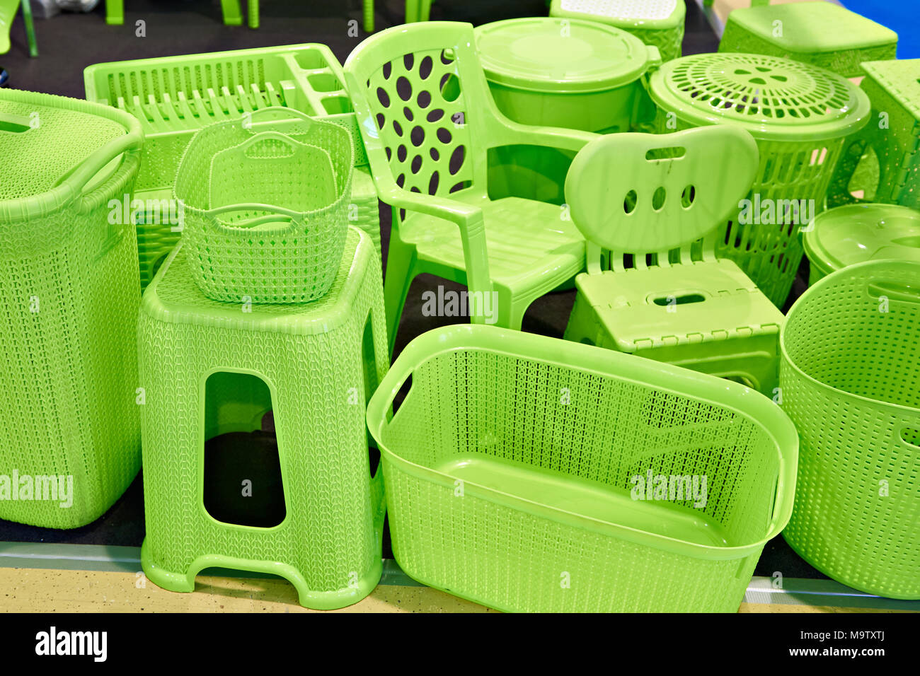 Products from plastic - chairs and household boxes Stock Photo - Alamy