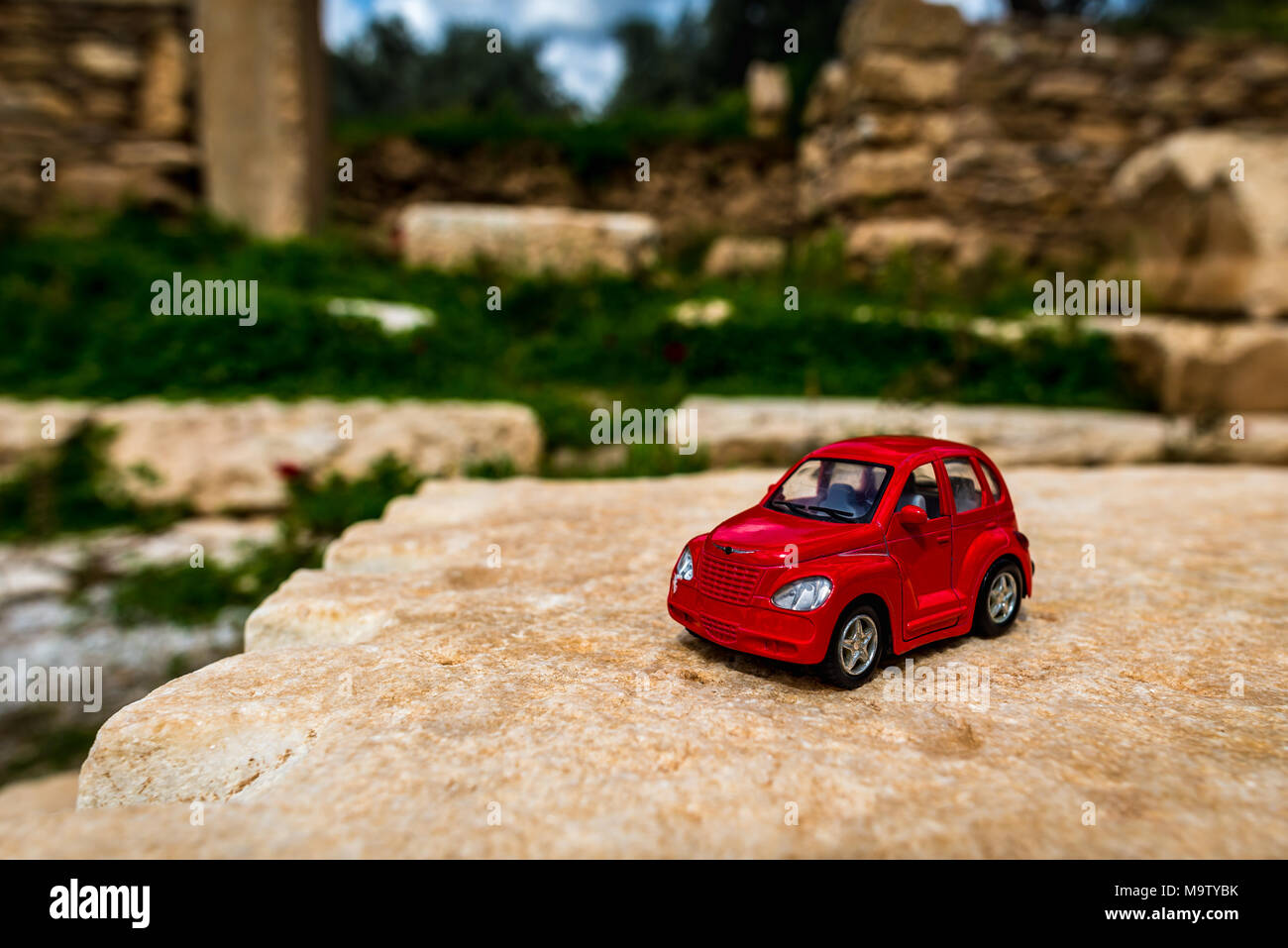 Toy/model car on stone surface Stock Photo - Alamy