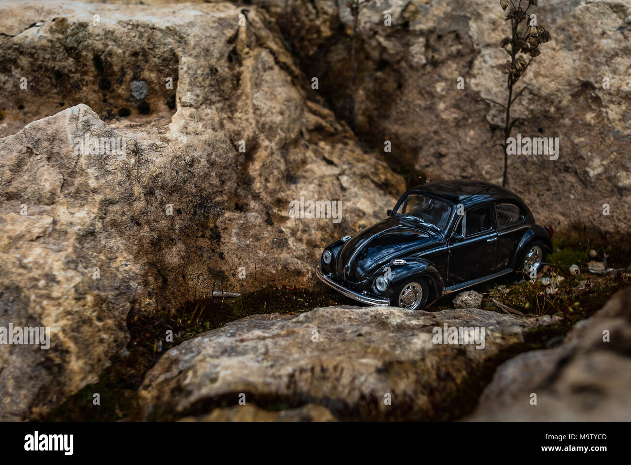 Toy/model car on stone surface Stock Photo - Alamy