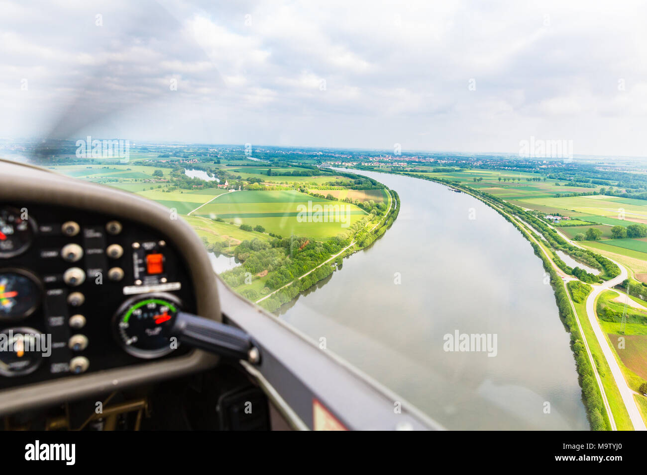 View from a flying sport plane over river landscape Stock Photo - Alamy