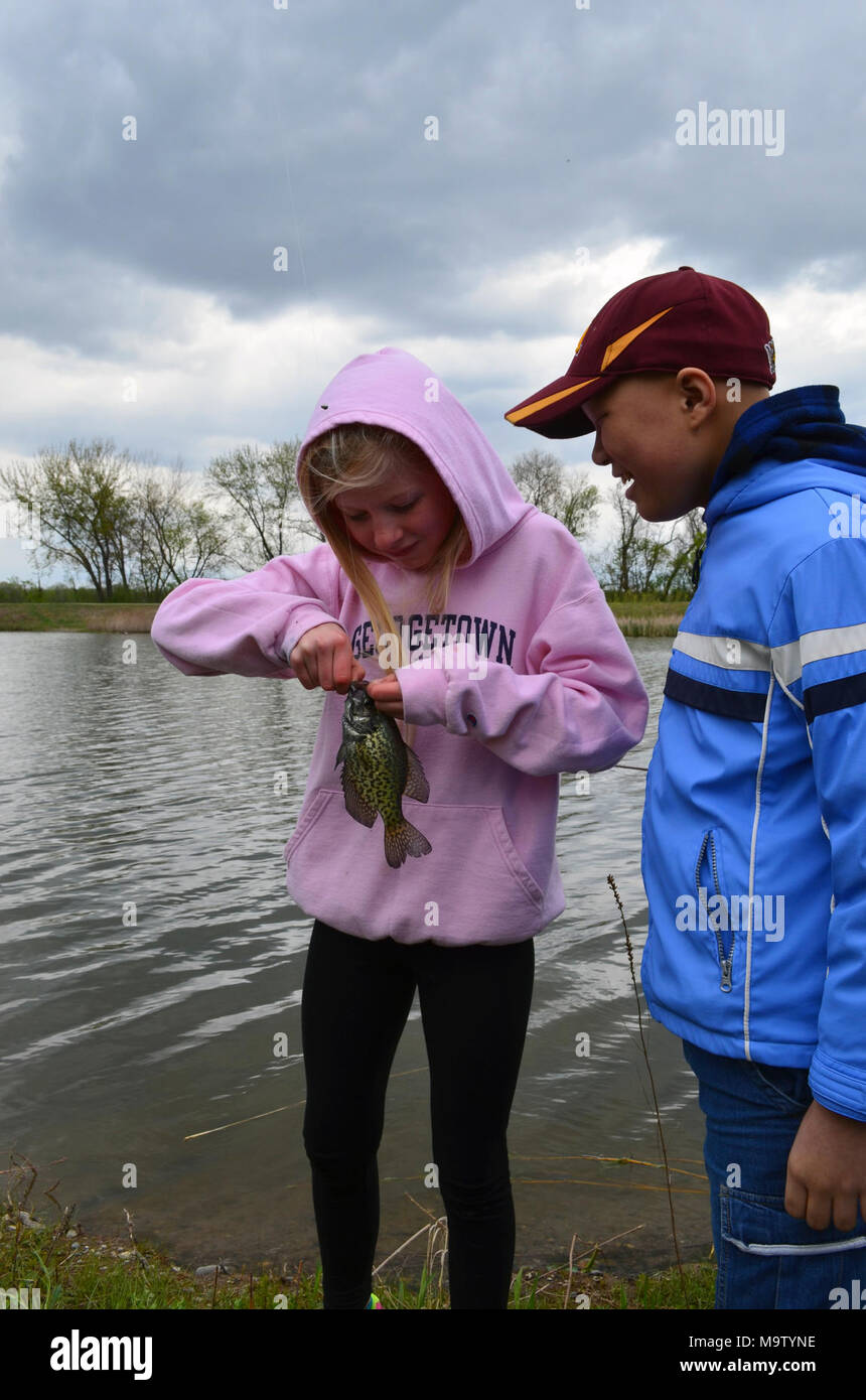 First fish of the day!. First fish of the day! Stock Photo - Alamy