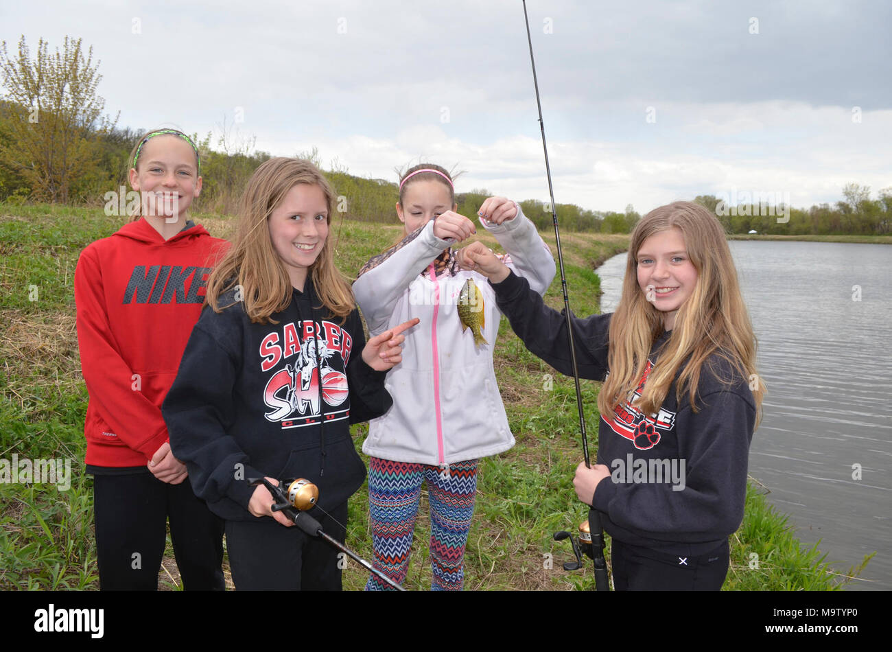 The girls are excited about this fish. The girls are excited about this ...