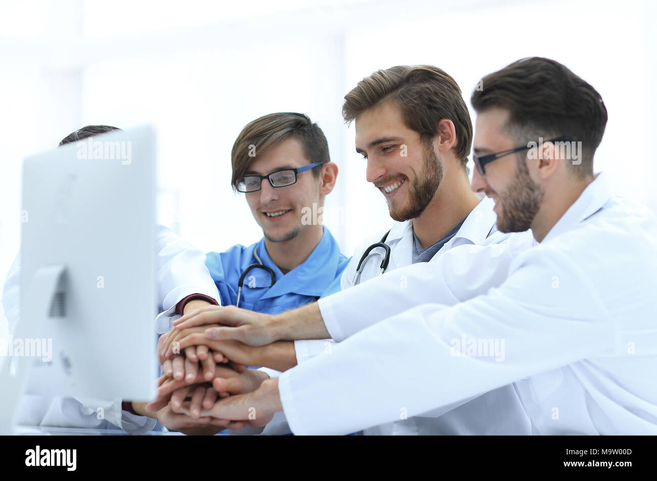 medical team showing their unity Stock Photo - Alamy