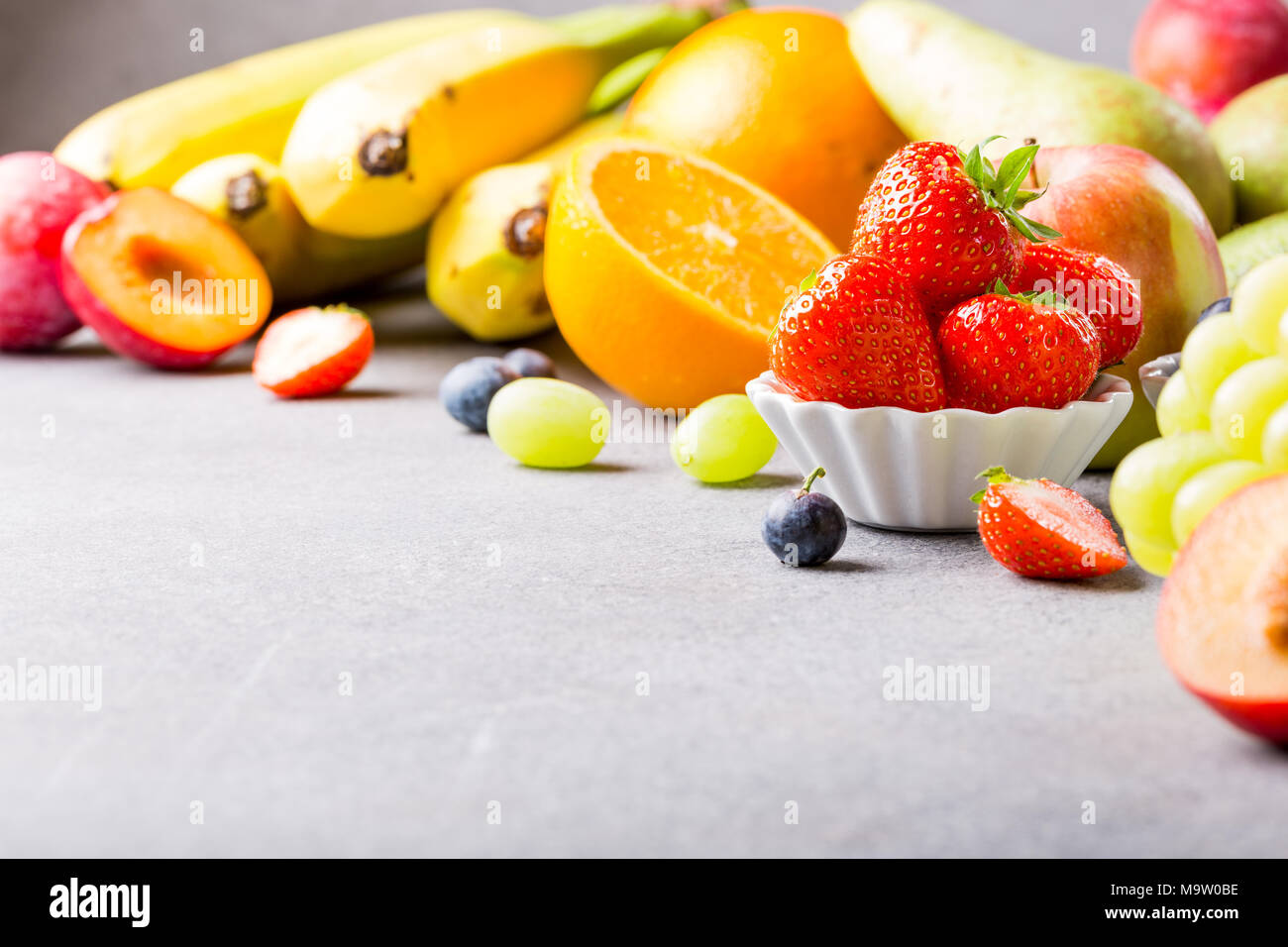 Fresh assorted fruits and berries Stock Photo - Alamy