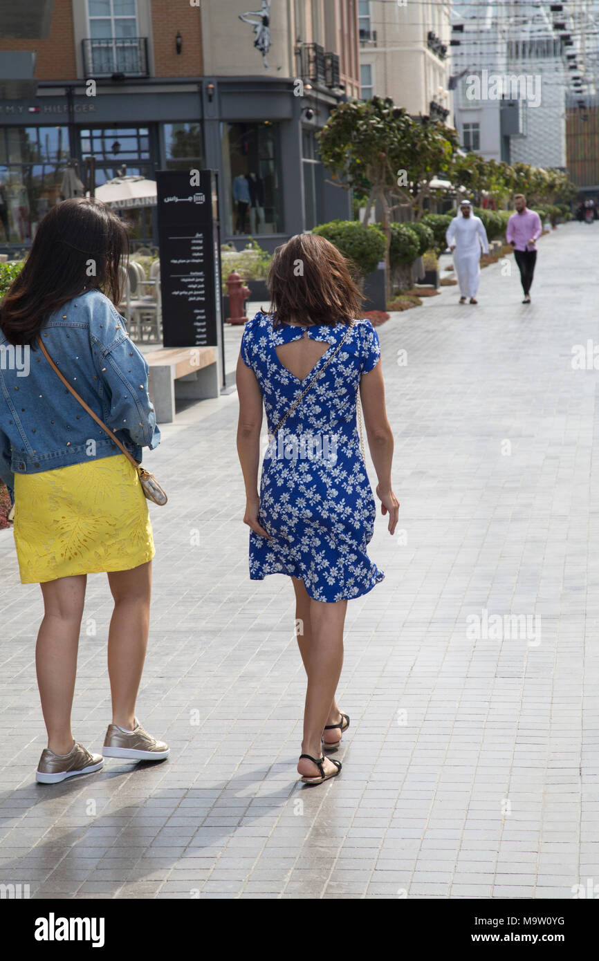 Back view two women outside walking hi-res stock photography and images ...