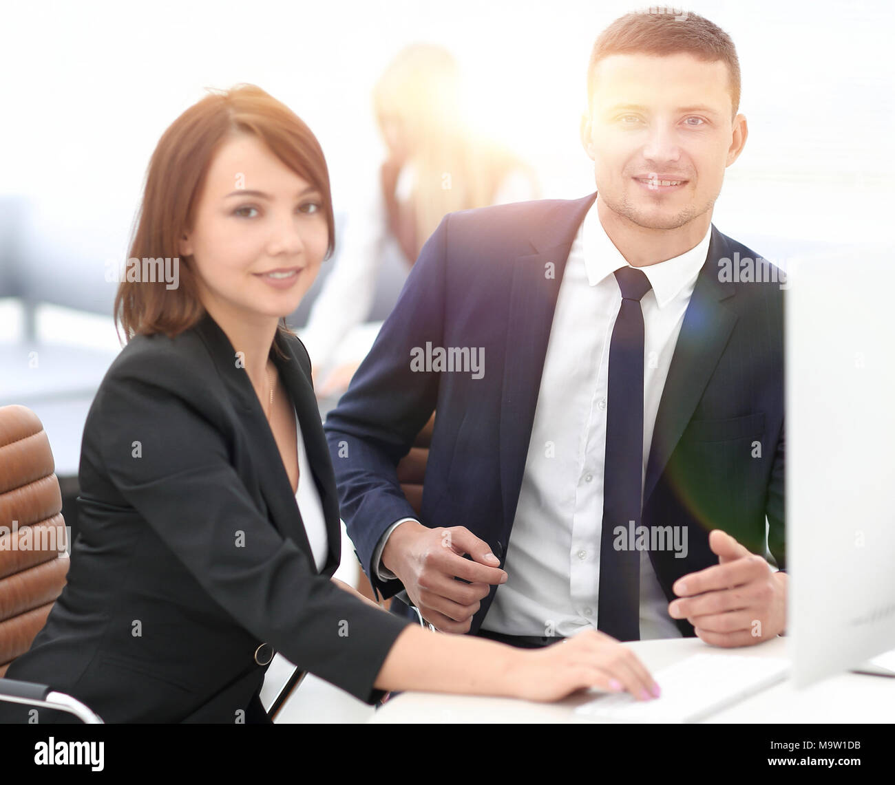 Experienced company employees sitting hi-res stock photography and ...