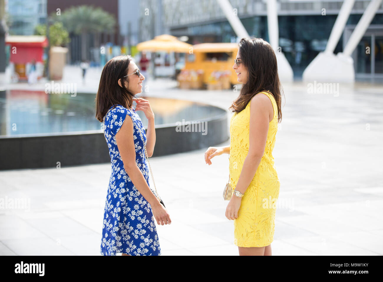 Two people facing each other talking hi-res stock photography and ...