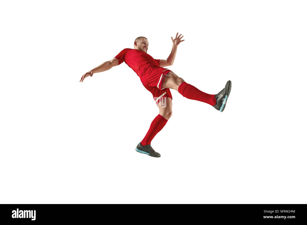 Professional football soccer player in motion isolated on white studio ...
