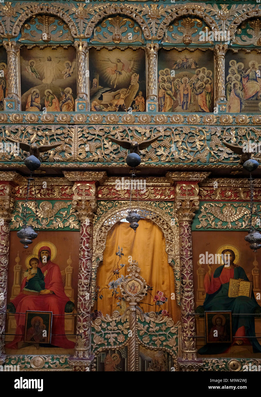 The iconostasis decorated with icons and religious paintings inside the Greek Orthodox Chapel of ...