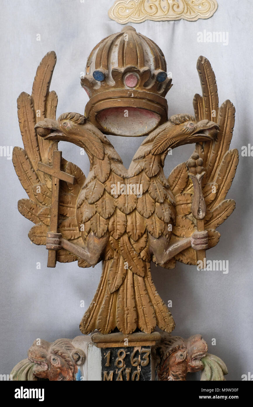 A wooden emblem of the Greek Orthodox Church depicted as double-headed ...