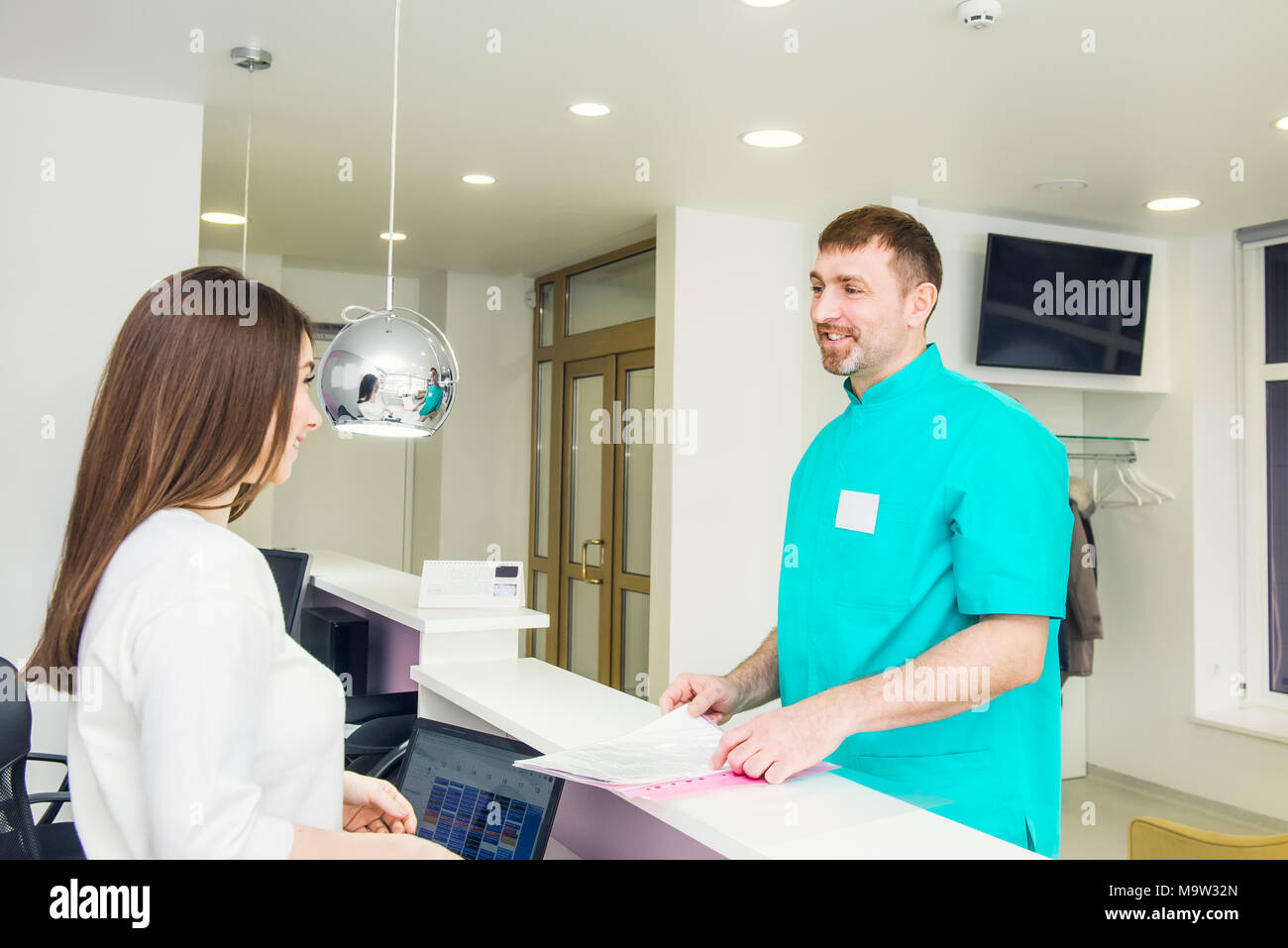 Hospital reception desk hi-res stock photography and images - Alamy