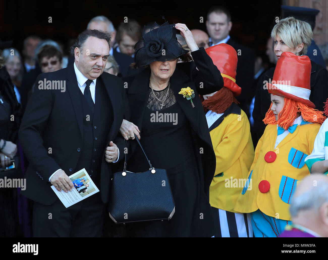 Sir Ken Dodd's wife Lady Anne and nephew John Lewis after the funeral ...