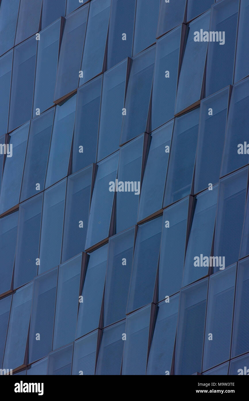 a beautiful detail shot of a modern building, blue windows, Milan ...