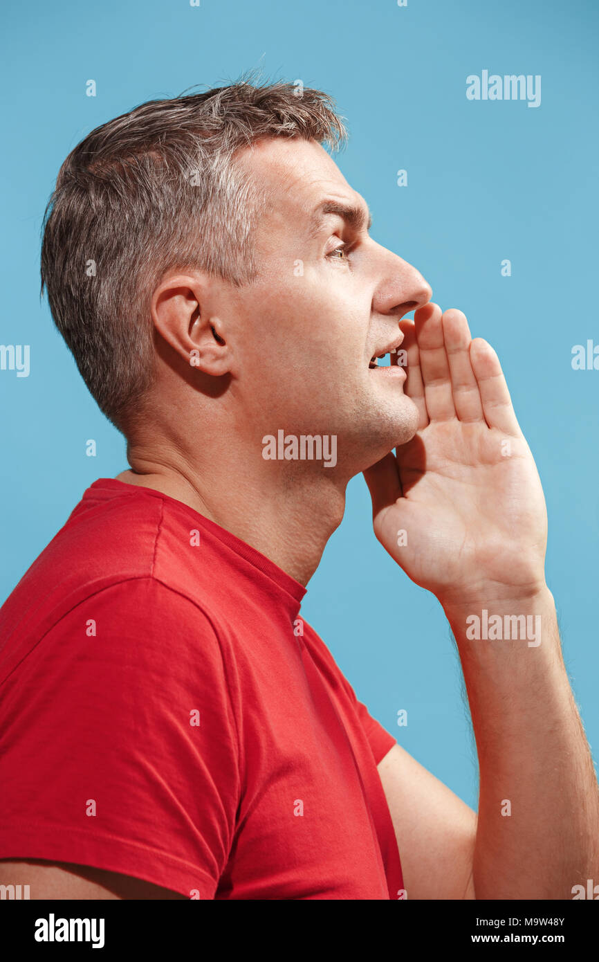 Young man shouting profile hi-res stock photography and images - Alamy