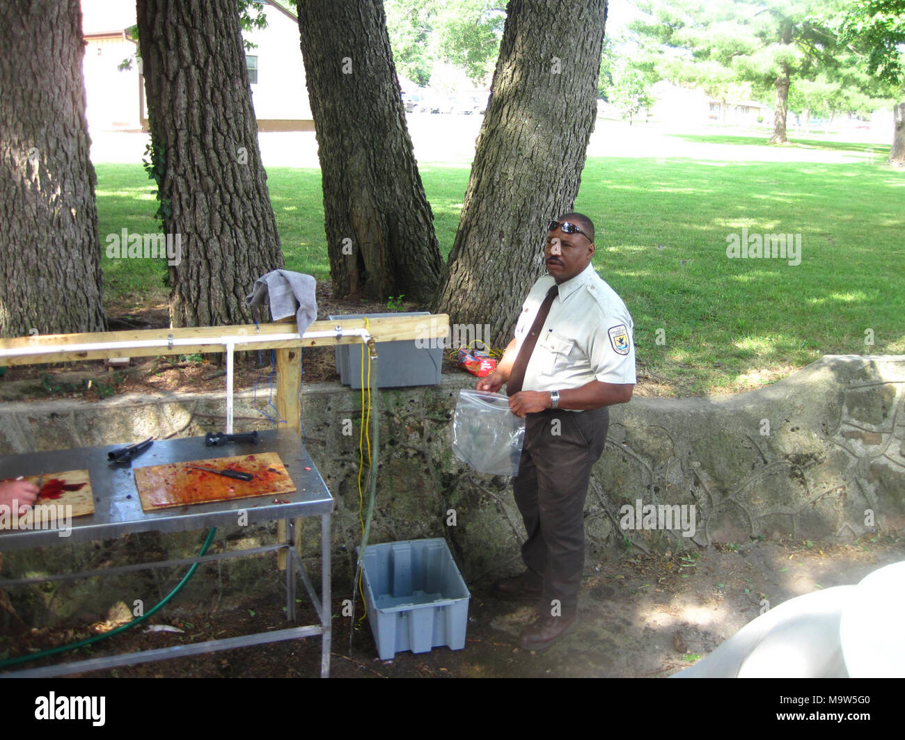 Hatchery staff at the cleaning station. Hatchery staff at the cleaning ...