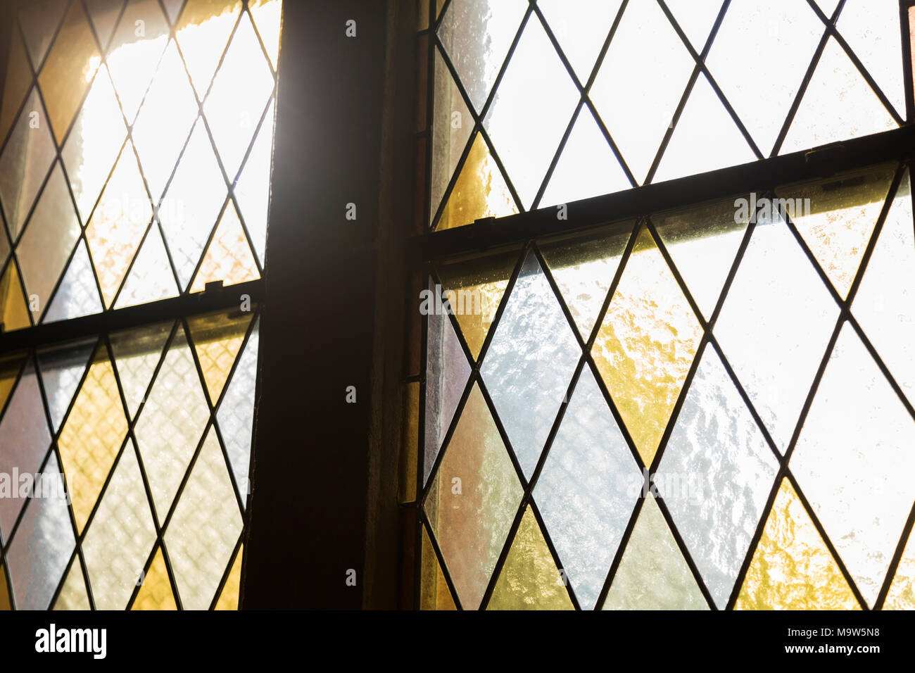 Mosaic gothic wooden window in catholic or christian church Stock Photo ...