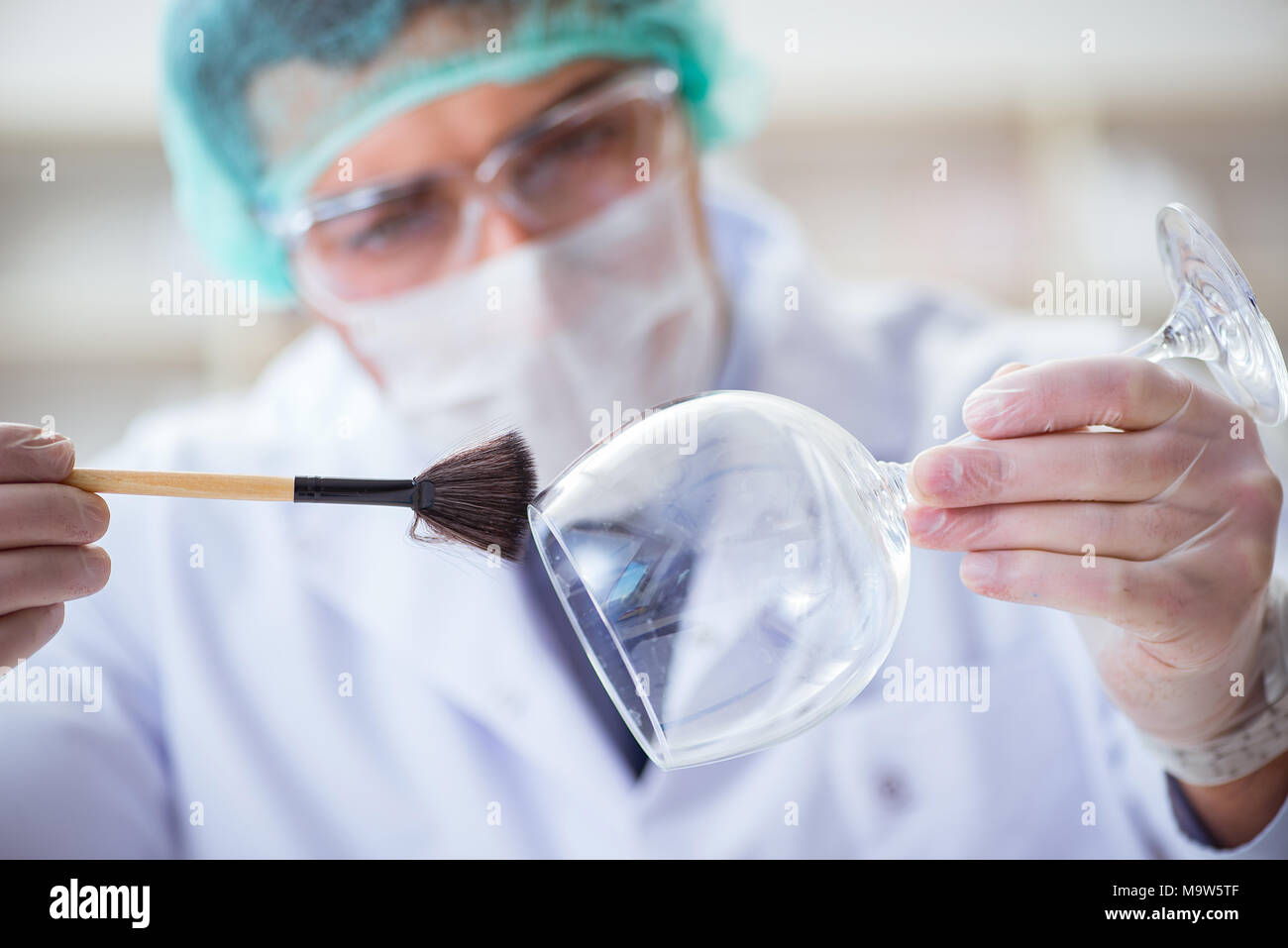 Forensics investigator working in lab on crime evidence Stock Photo - Alamy