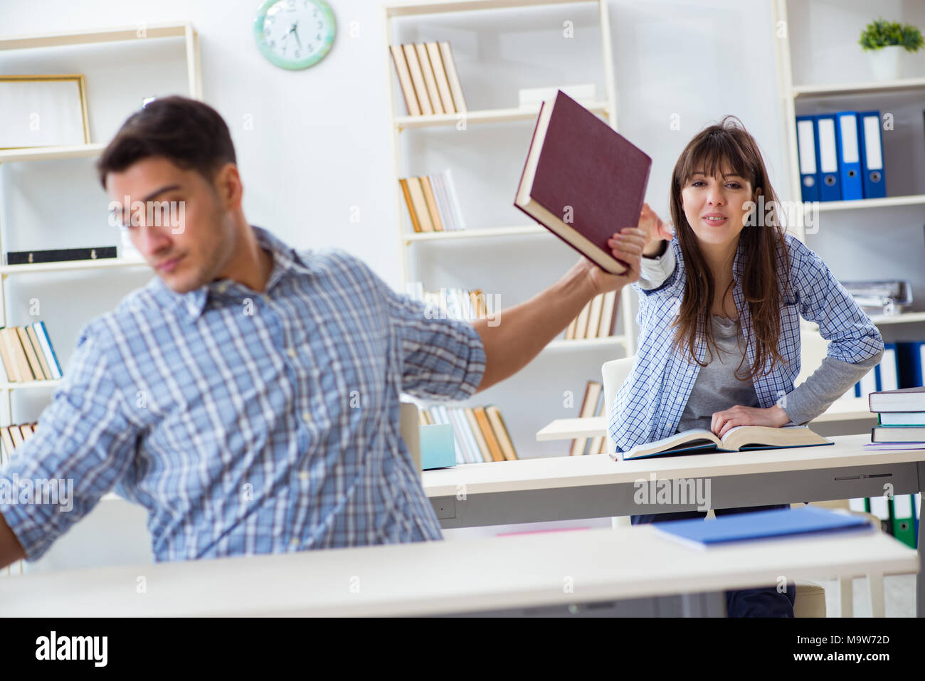 Students sitting and studying in classroom college Stock Photo - Alamy