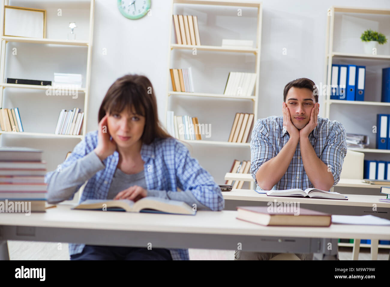 Students sitting and studying in classroom college Stock Photo - Alamy