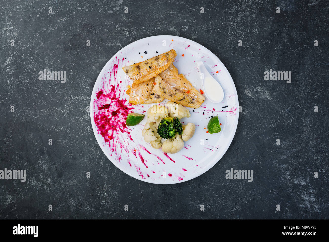Fried pike-perch with cauliflower and broccoli Stock Photo - Alamy