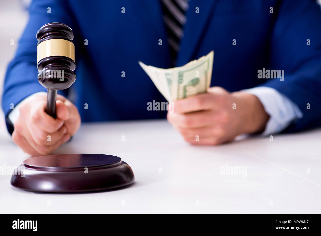 Lawyer receiving money as bribe hi-res stock photography and images - Alamy