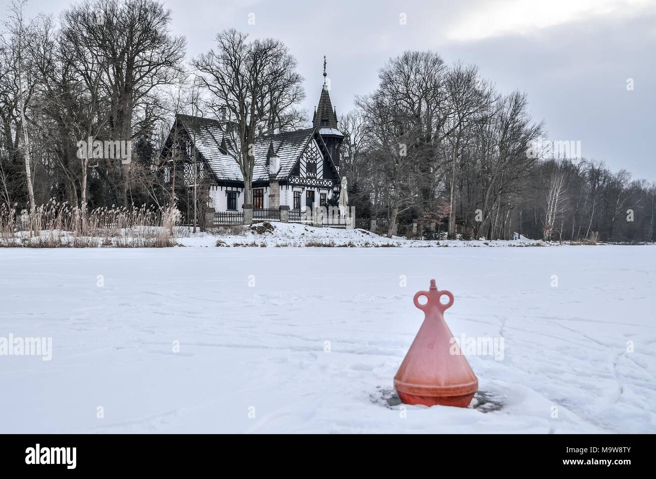 Beautiful historic castle in a winter scenery. Historic Hunting Palace ...