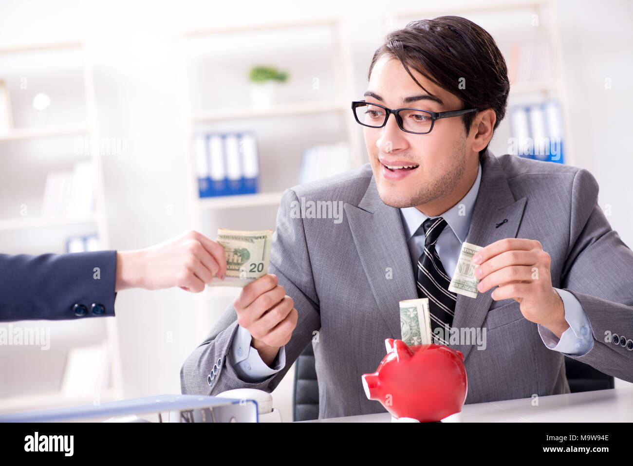 Businessman being offered bribe for breaking law Stock Photo - Alamy