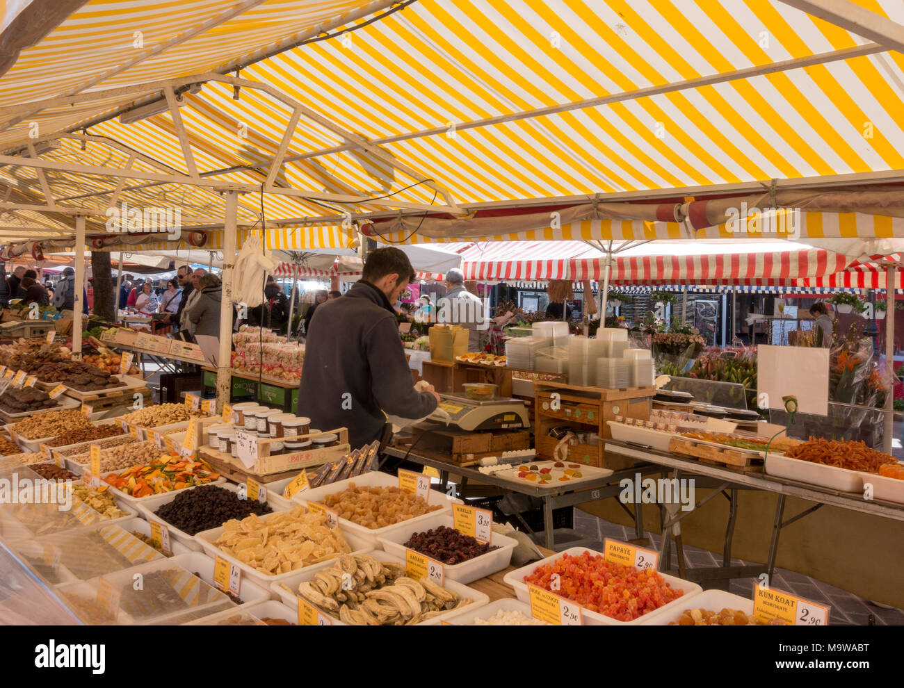 Market stall selling glace fruit in Nice, France Stock Photo - Alamy