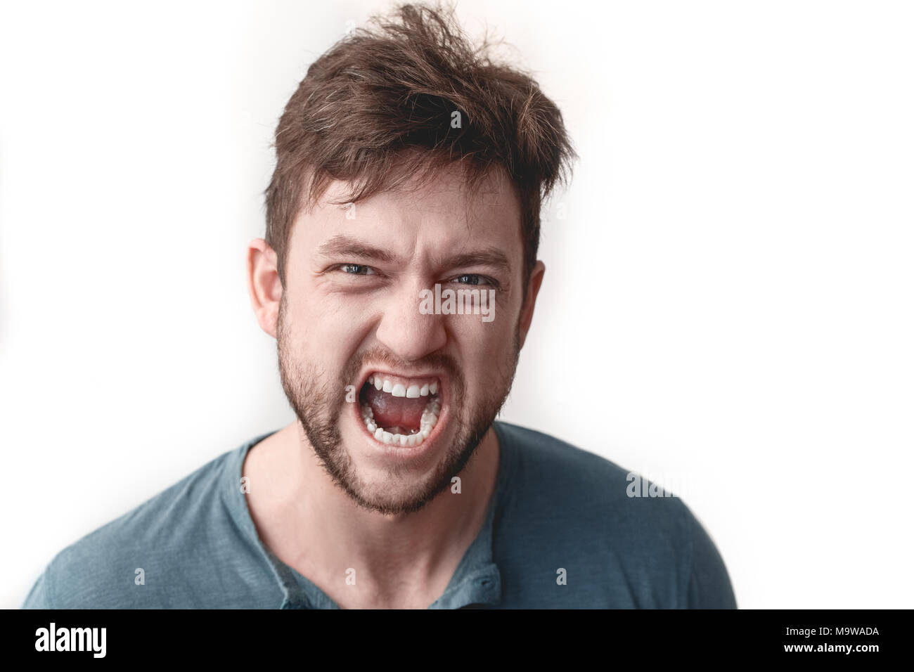 Man isolated on white wall emotions concept screaming Stock Photo - Alamy