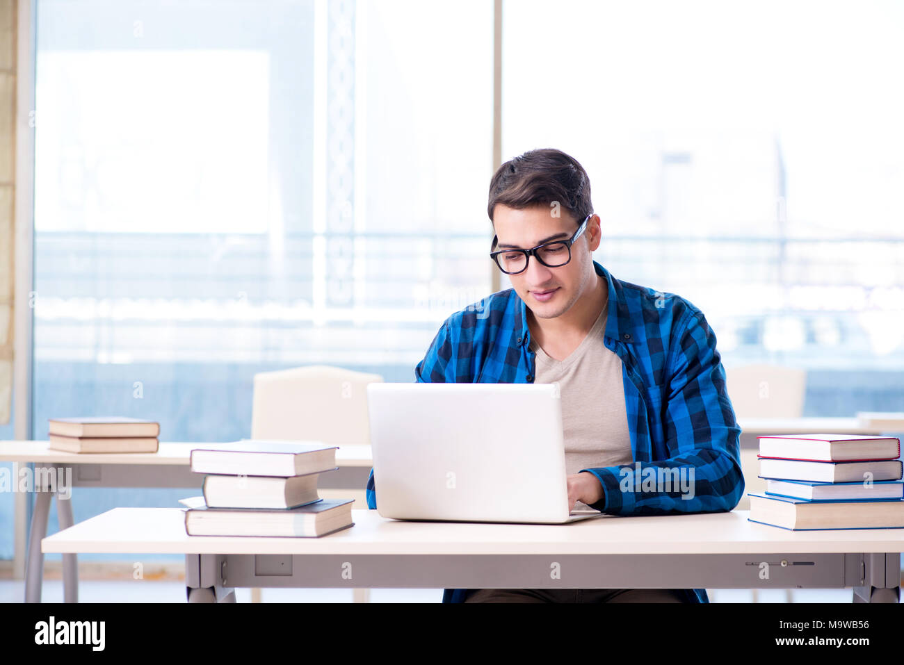 Student in telelearning distance learning concept reading in library ...